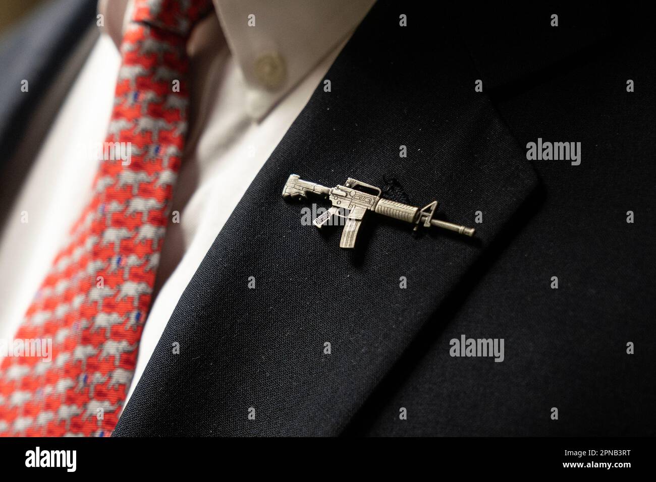 Member of Republican team wearing semi-automatic rifle pin during House ...