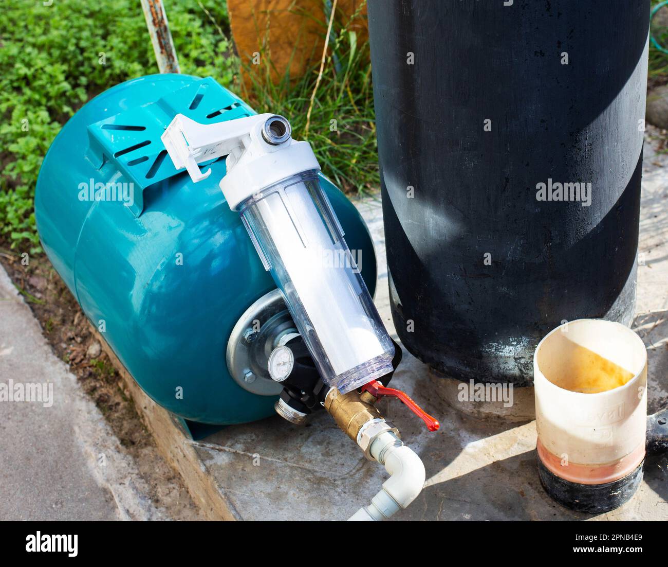 The system of modern water supply in a country house from a well source ...