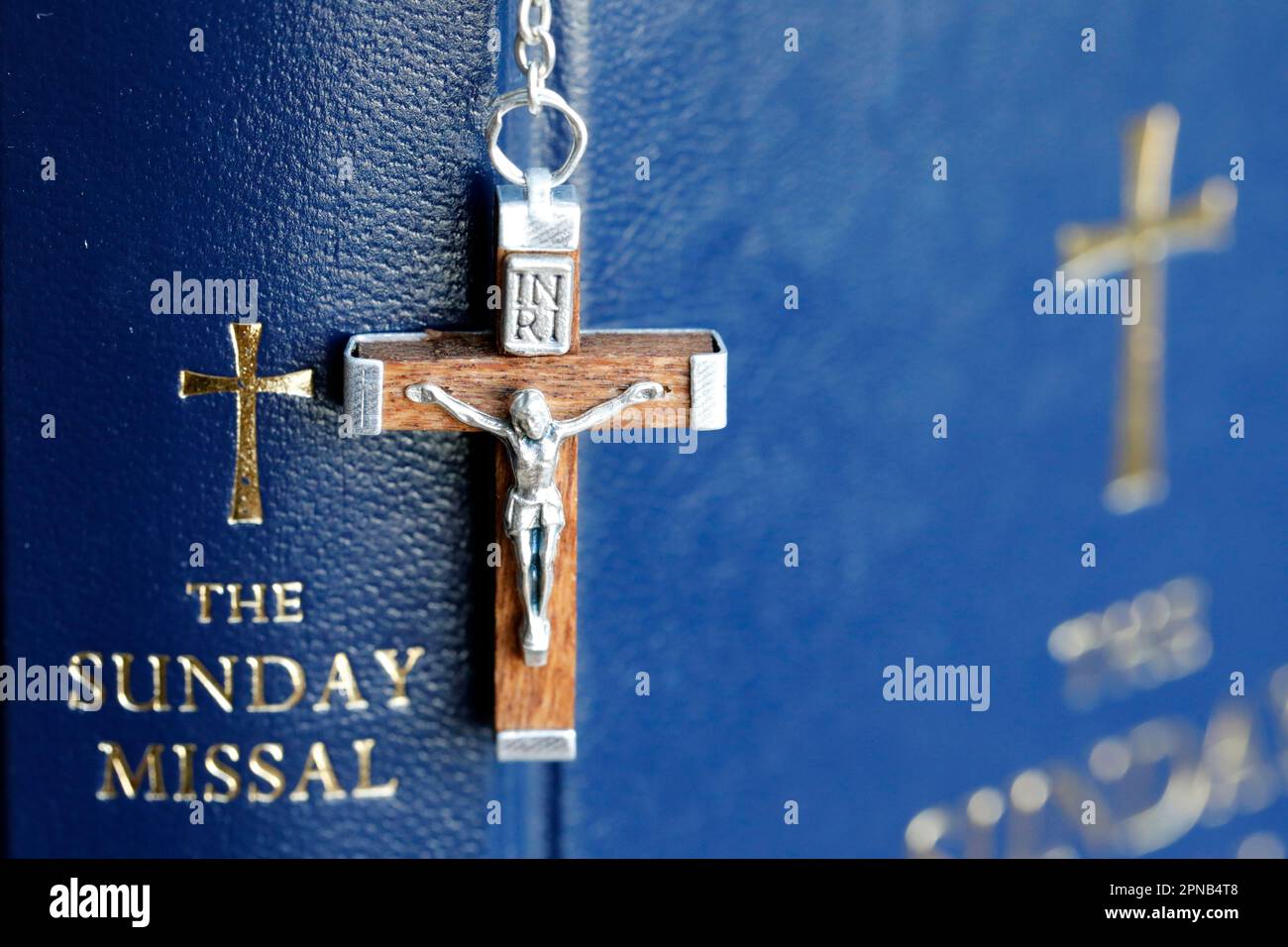 Sunday missal with crucifix Stock Photo - Alamy