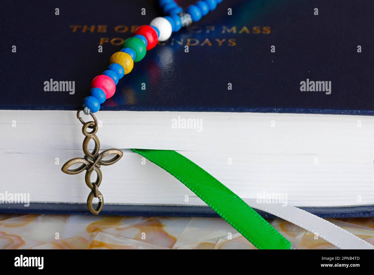 Sunday missal with christian cross Stock Photo - Alamy