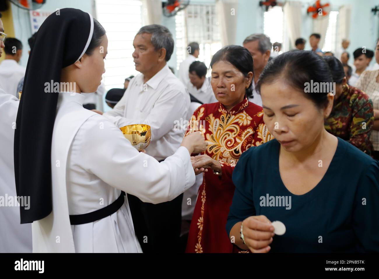 Sunday mass. Roman catholic church. The holly communion. Ho Chi Minh ...