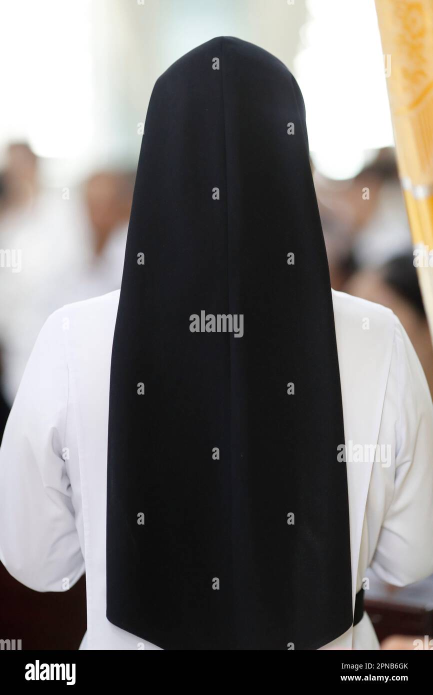 Back view of a dominican sister. Catholic church. Ho Chi Minh City ...