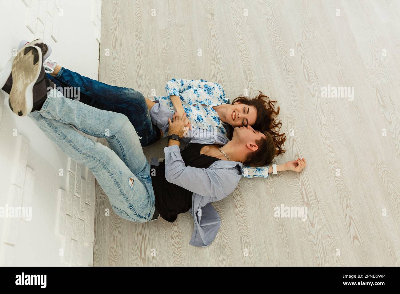 Young couple fooling around indoors Stock Photo - Alamy