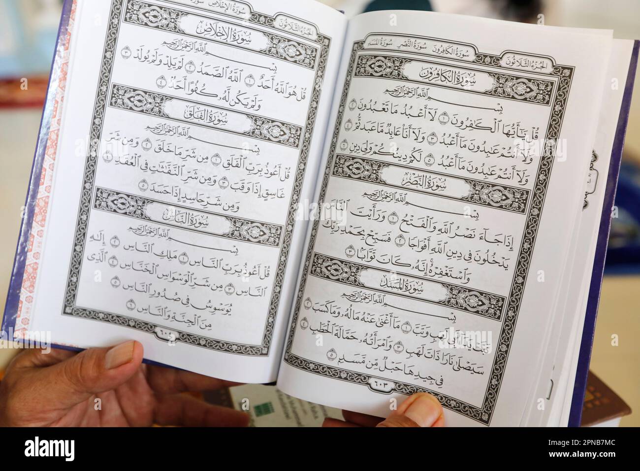 Masjid Nia'mah mosque. Muslim men reading the Holy Quran. Chau Doc ...