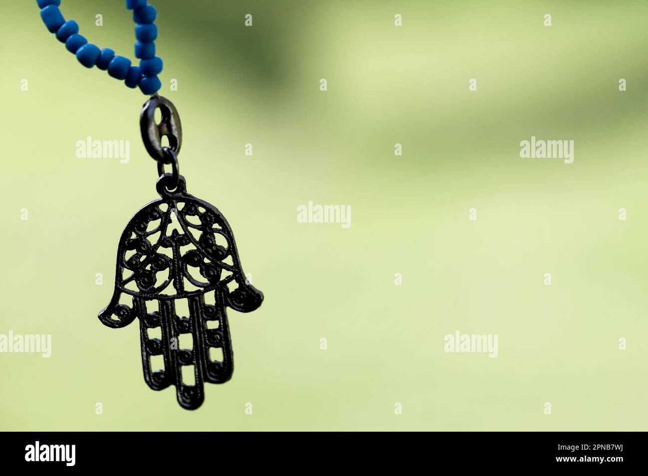 Closeup of an muslim hamsa amulet, also known of the hand of fatima or ...
