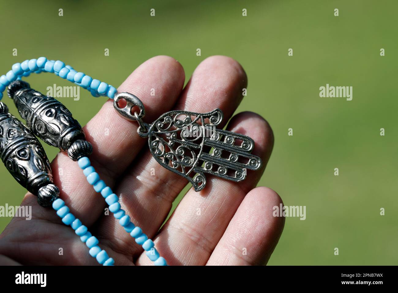 Closeup of an muslim hamsa amulet, also known of the hand of fatima or ...