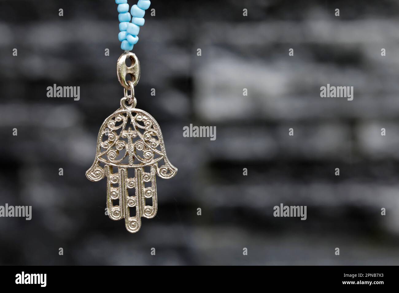 Closeup of a muslim hamsa amulet, also known of the hand of fatima or ...