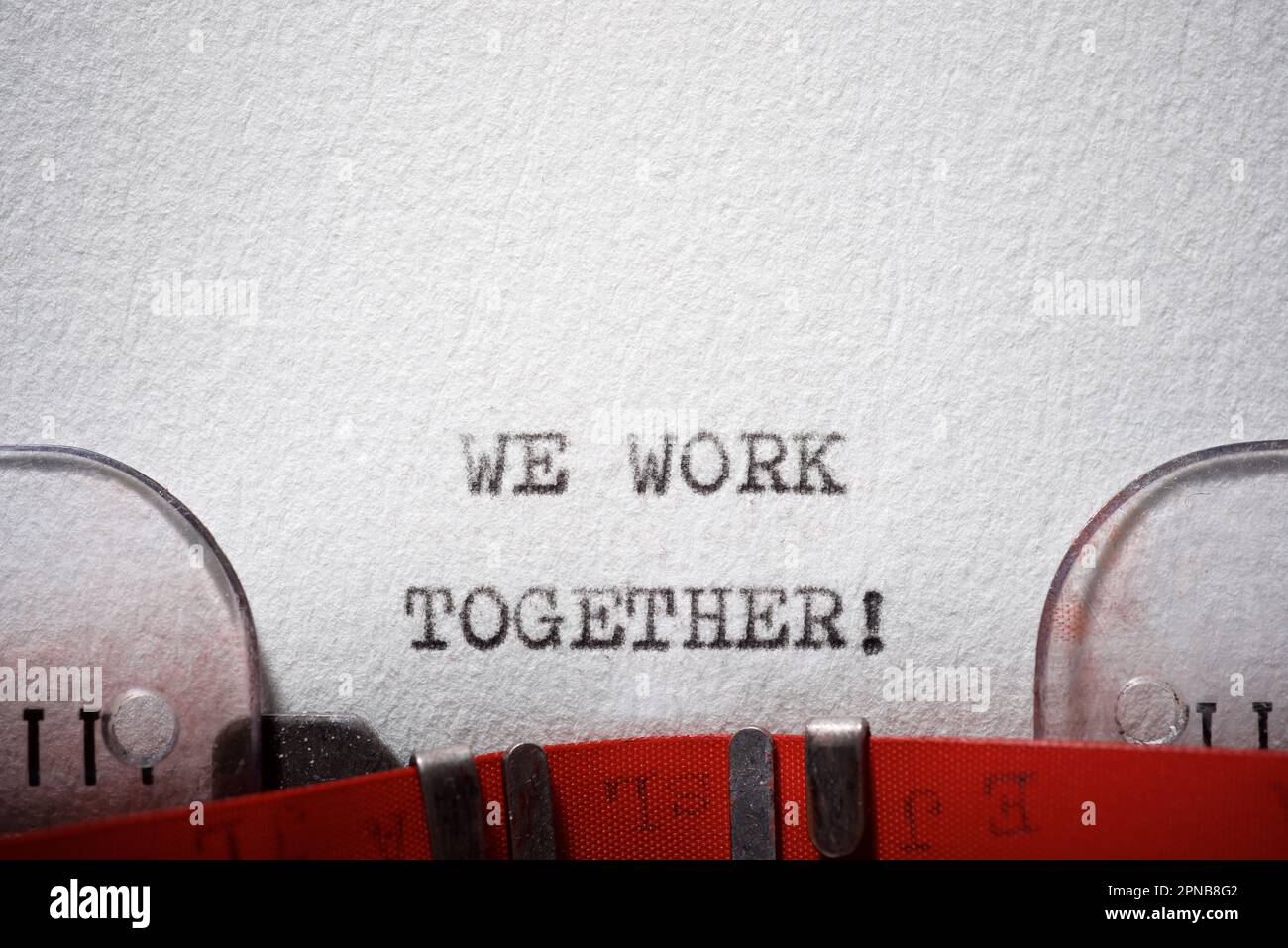 We work together text written with a typewriter Stock Photo - Alamy