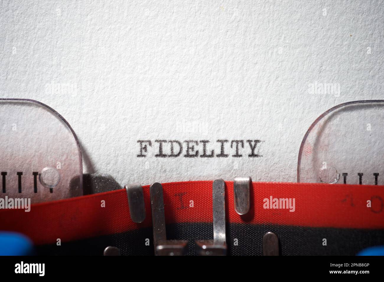 Fidelity word written with a typewriter Stock Photo - Alamy