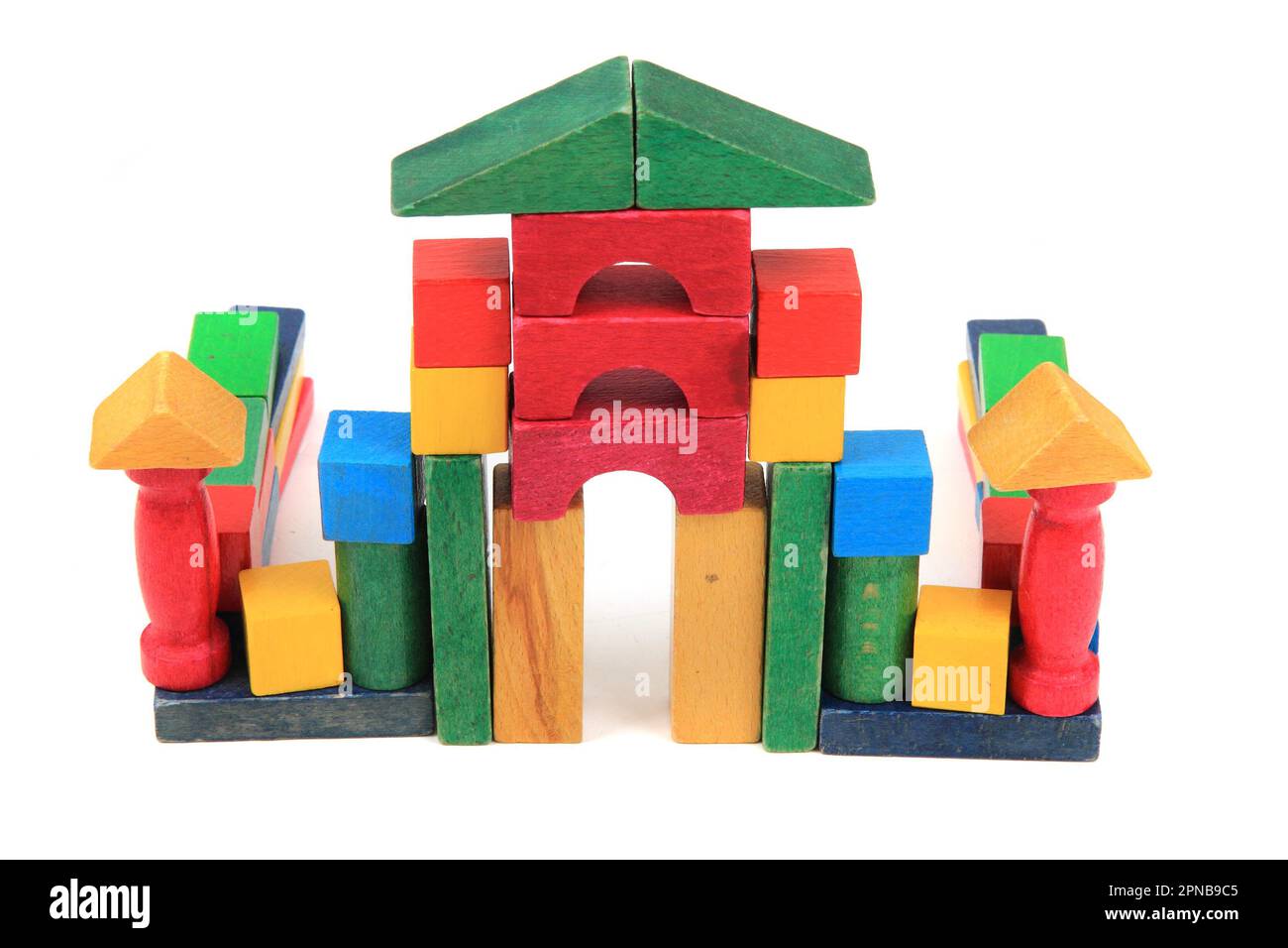 castle from wooden color bricks isolate don the white background Stock ...