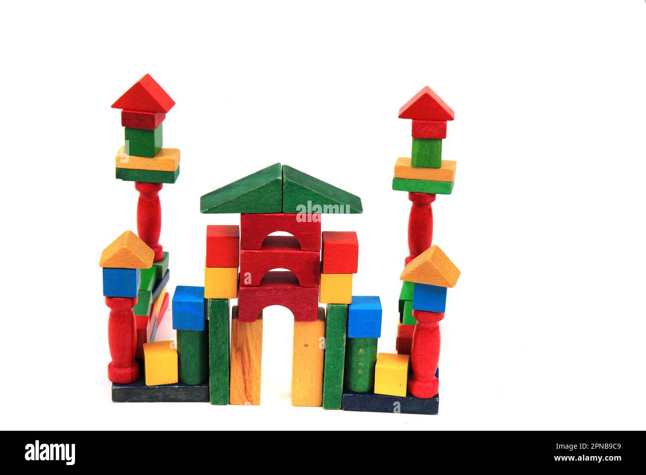 castle from wooden color bricks isolate don the white background Stock ...