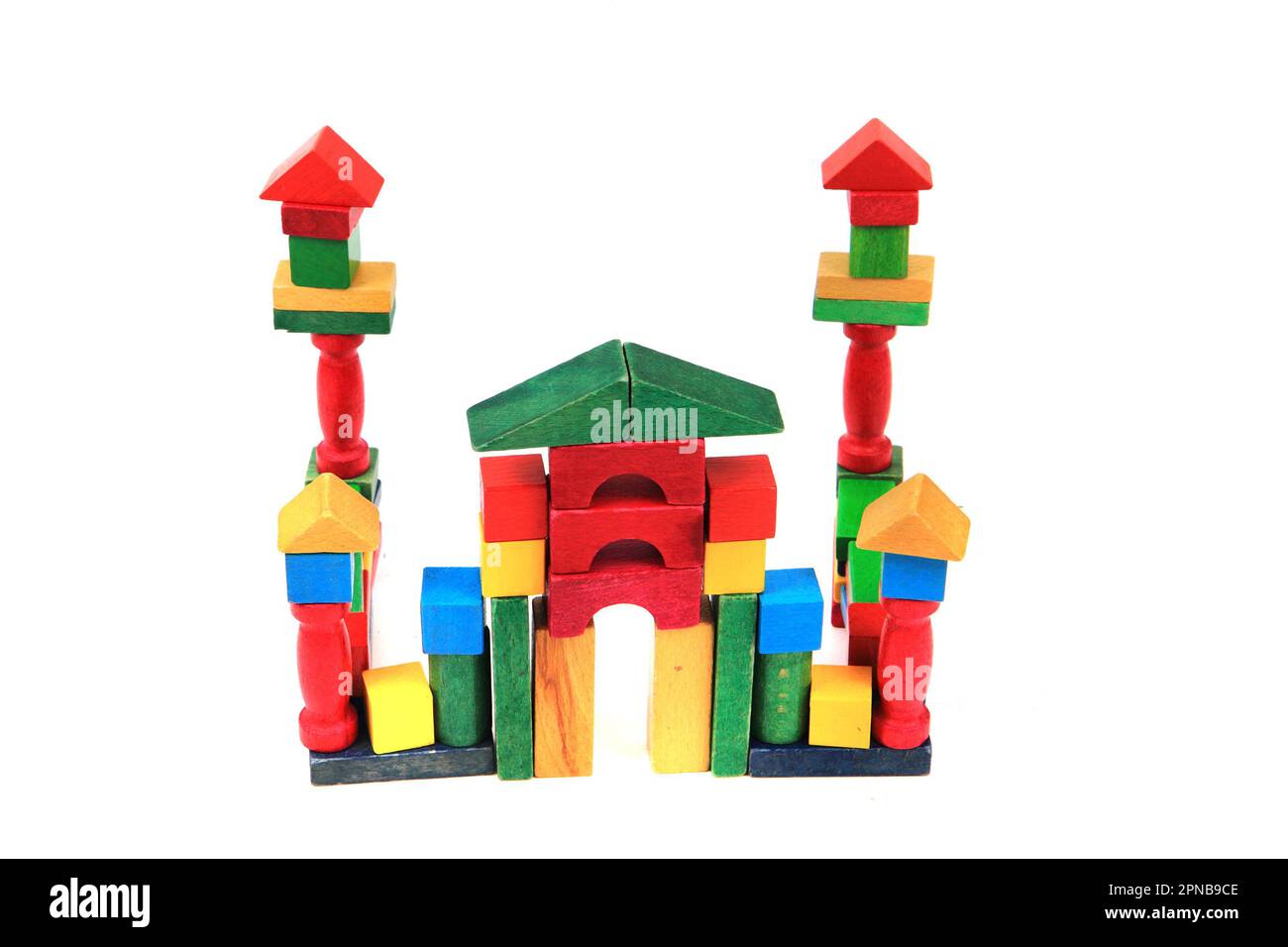 castle from wooden color bricks isolate don the white background Stock ...