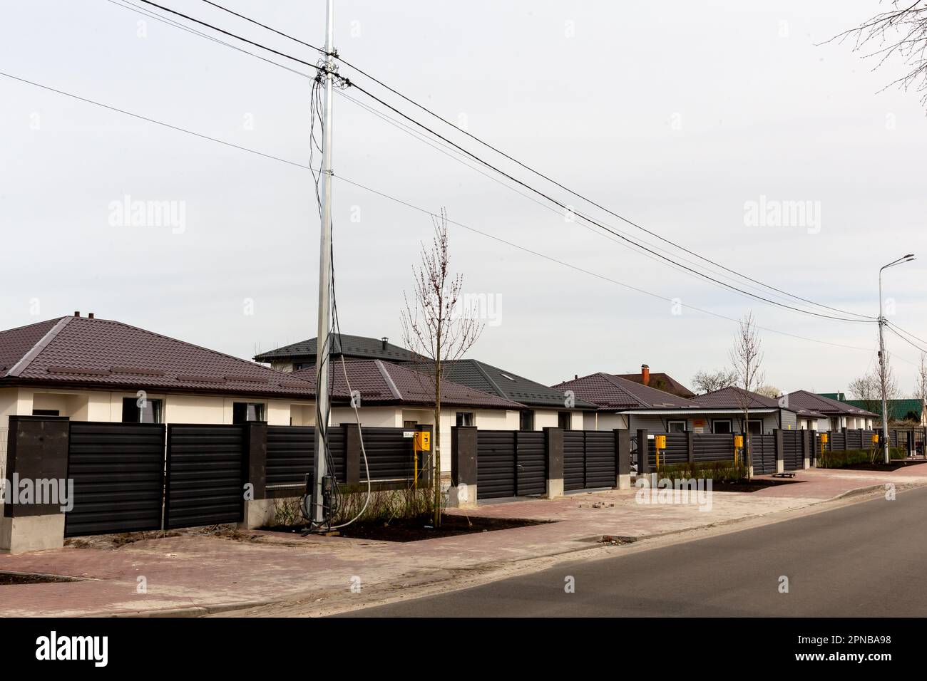 Bucha, Ukraine. 17th Apr, 2023. Renovated residential houses, fences ...