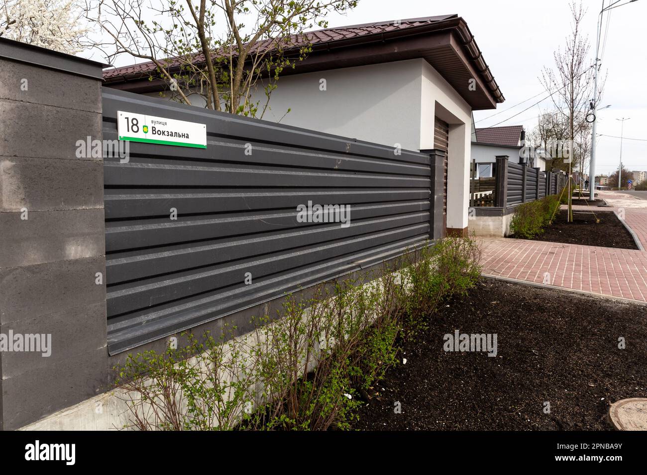 Bucha, Ukraine. 17th Apr, 2023. Renovated residential houses, fences ...