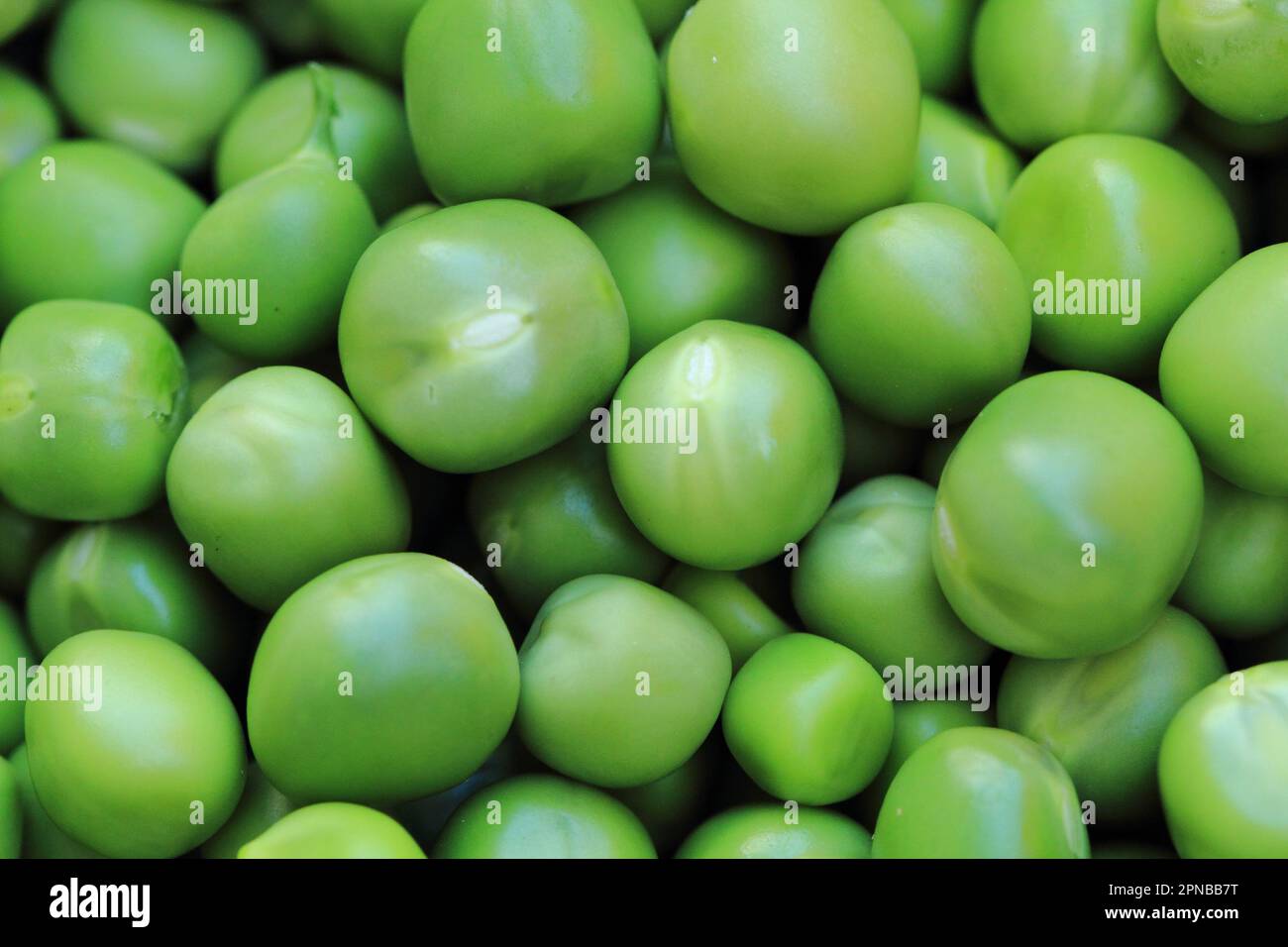 green fresh pea as natural food background Stock Photo - Alamy