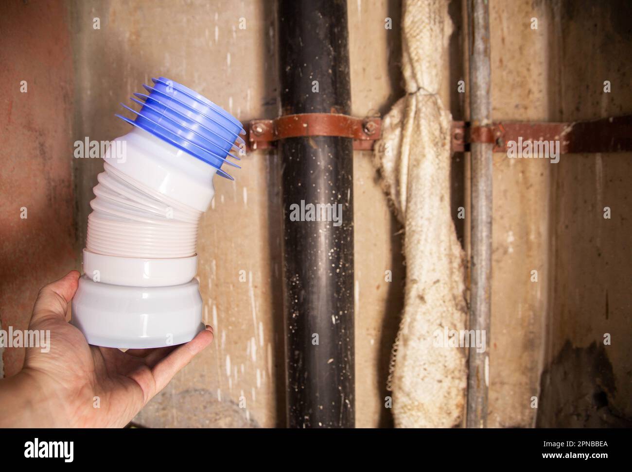 corrugated pipe for connecting the toilet in the toilet. Detail in ...