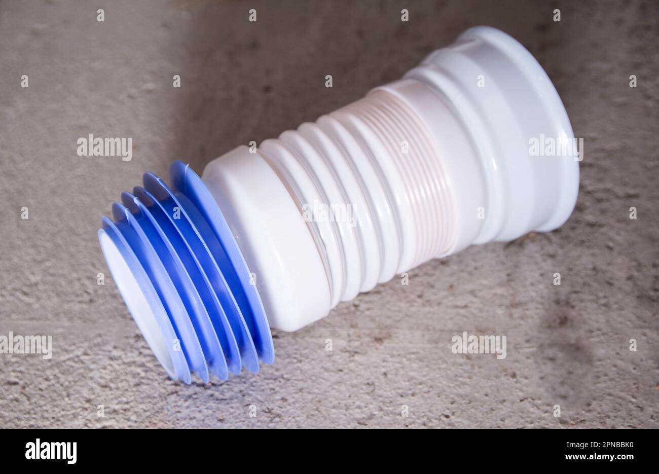 corrugated pipe for connecting the toilet in the toilet. Detail in ...
