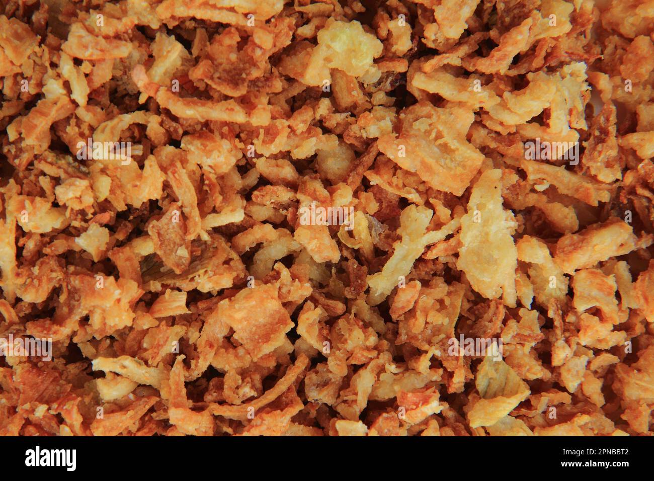 dried fried onion as exotic kitchen background Stock Photo - Alamy