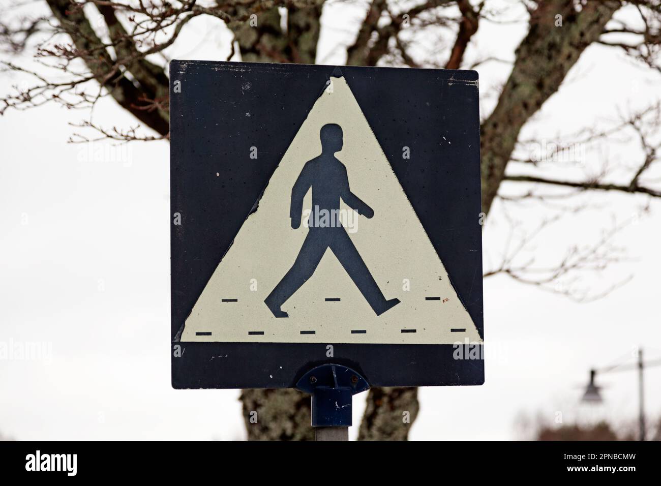 an old road sign marking pedestrian crossing Stock Photo - Alamy