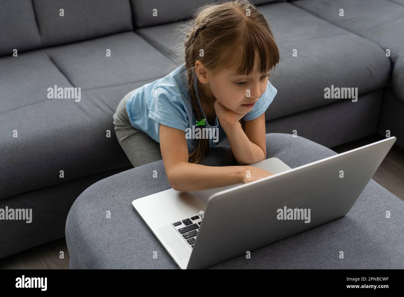 little girl studying with computer, little girl with laptop online ...