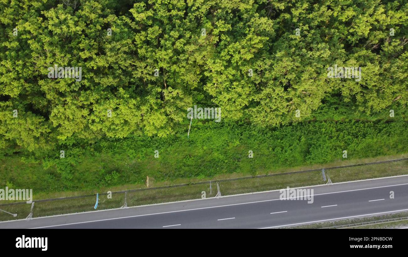 Aerial 4k footage asphalt road hi-res stock photography and images - Alamy