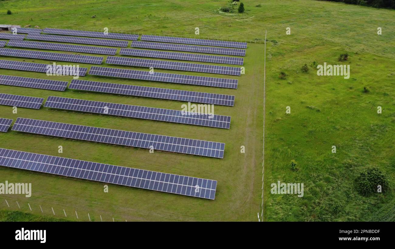 Aerial view of Solar Panels Farm solar cell with sunlight. Drone flight ...