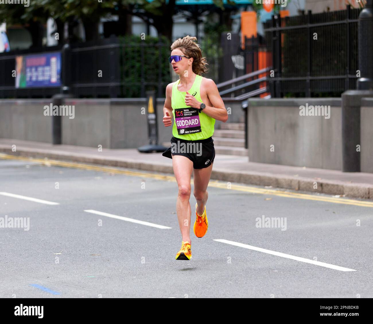 Edward Goddard running for Australia, passes through Cabot Square ...