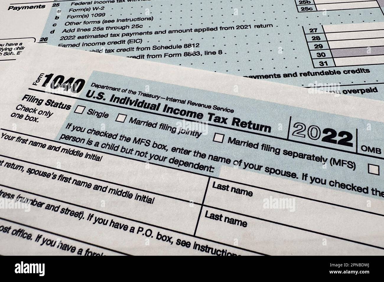 FILE - The Internal Revenue Service 1040 tax form for 2022 is ...