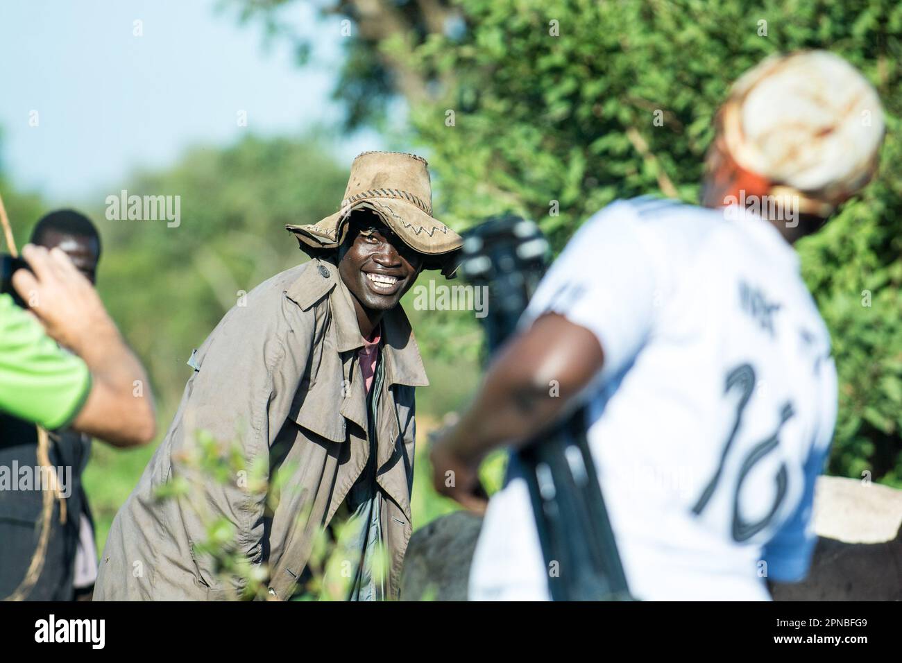 Men working on farm land. Lamwo district. Uganda Stock Photo - Alamy