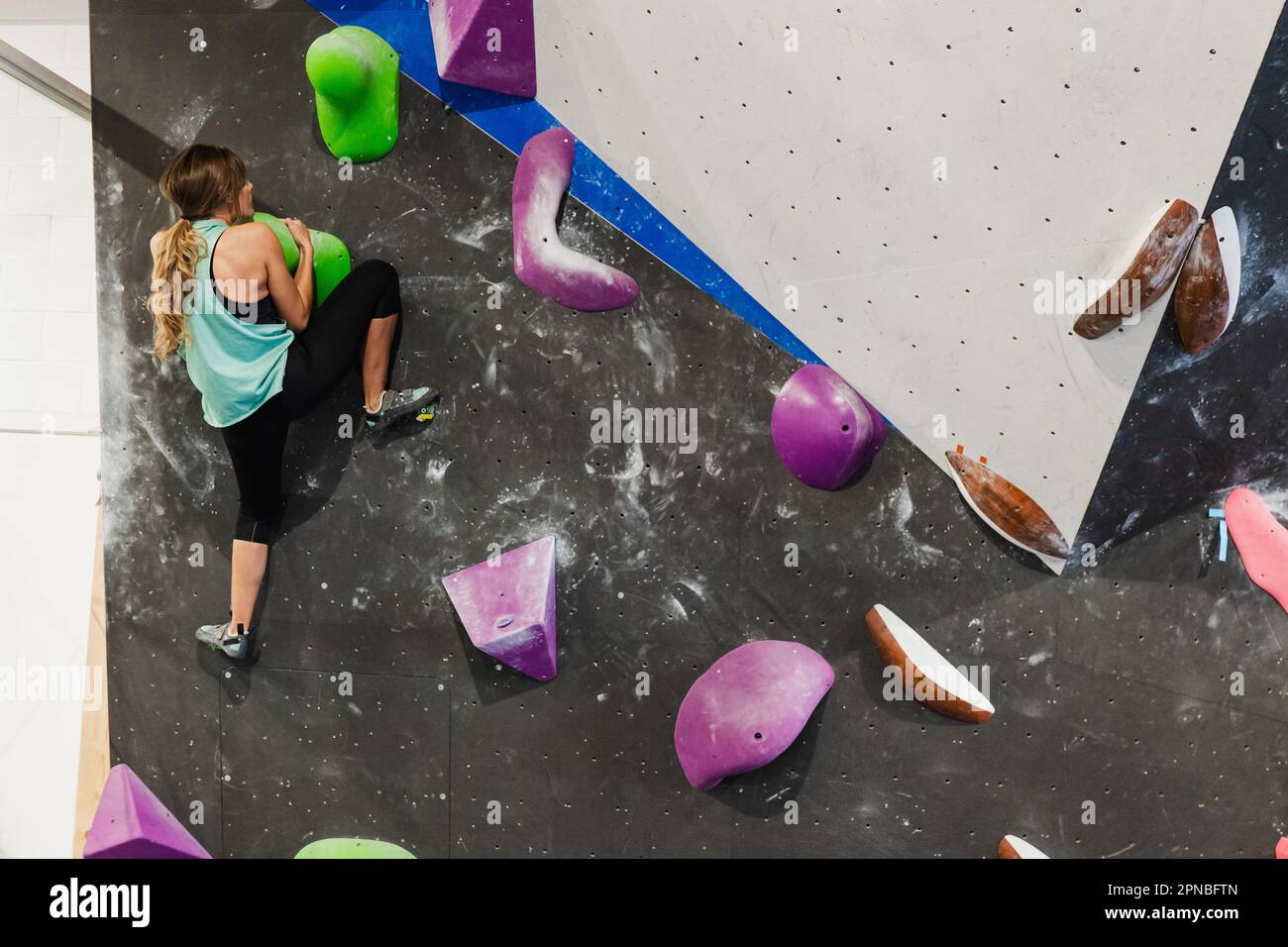 From below back view of unrecognizable female athlete in sportswear and ...