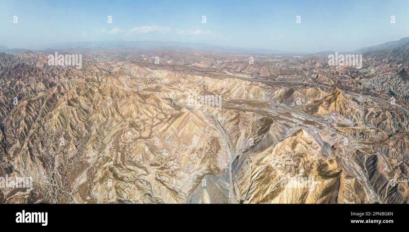 Aerial view of rough rugged mounts with uneven surface forming natural ...