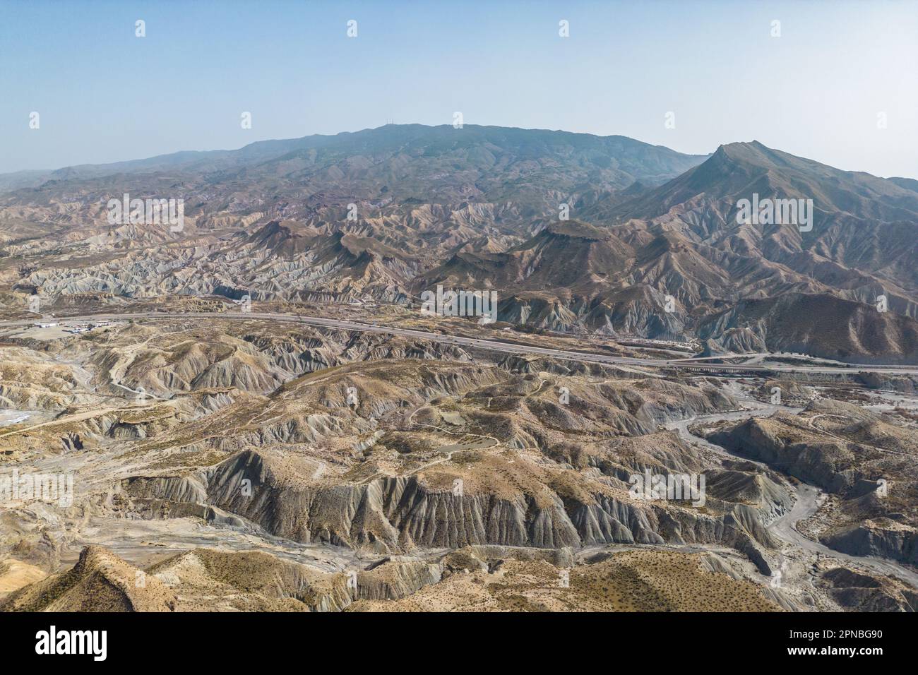 Aerial view of rough rugged mounts with uneven surface forming natural ...
