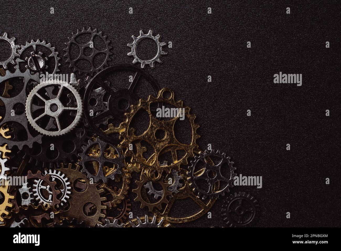 From above technical texture of steampunk gears on dark brown ...