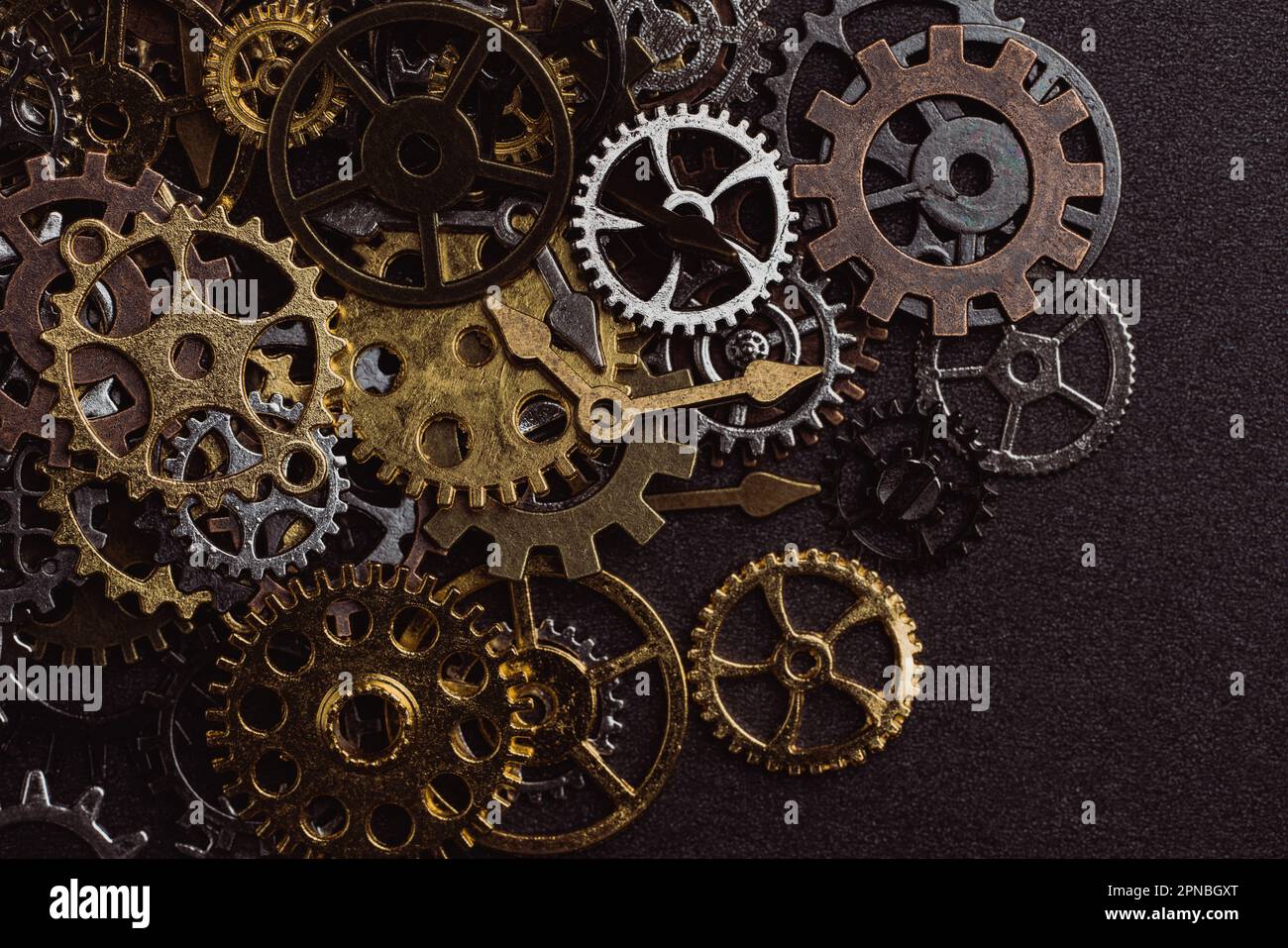From above technical texture of steampunk gears on dark brown ...