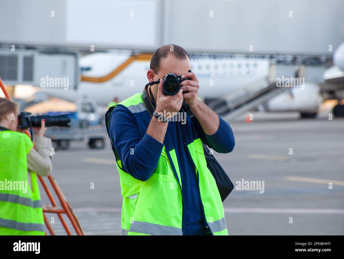 Plane Spotters at the airport. Photographers observe and photograph ...