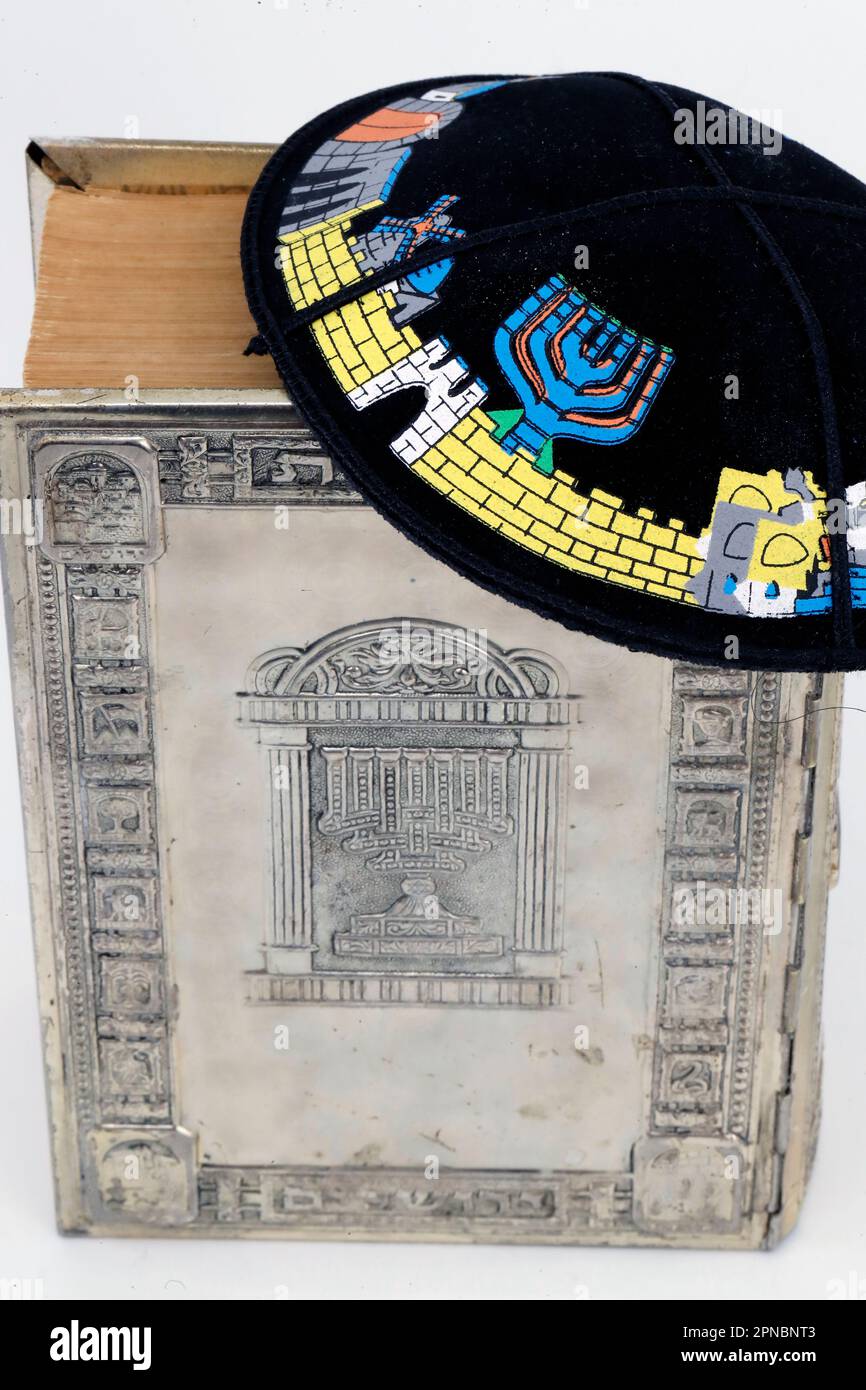 Kippah jewish cap and Torah book Stock Photo - Alamy