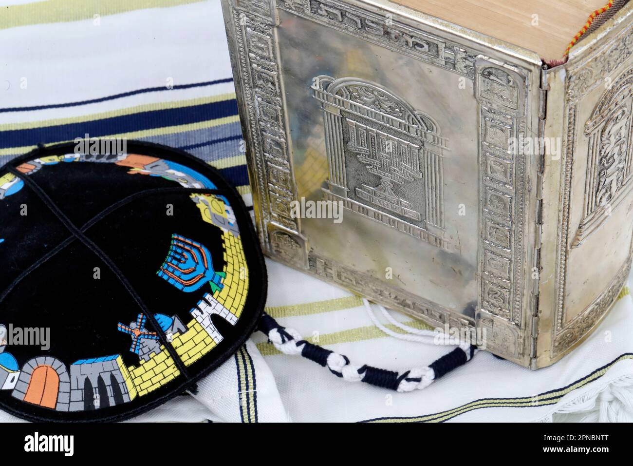 Kippah jewish cap, tallit and Torah book. Three jewish symbols Stock ...