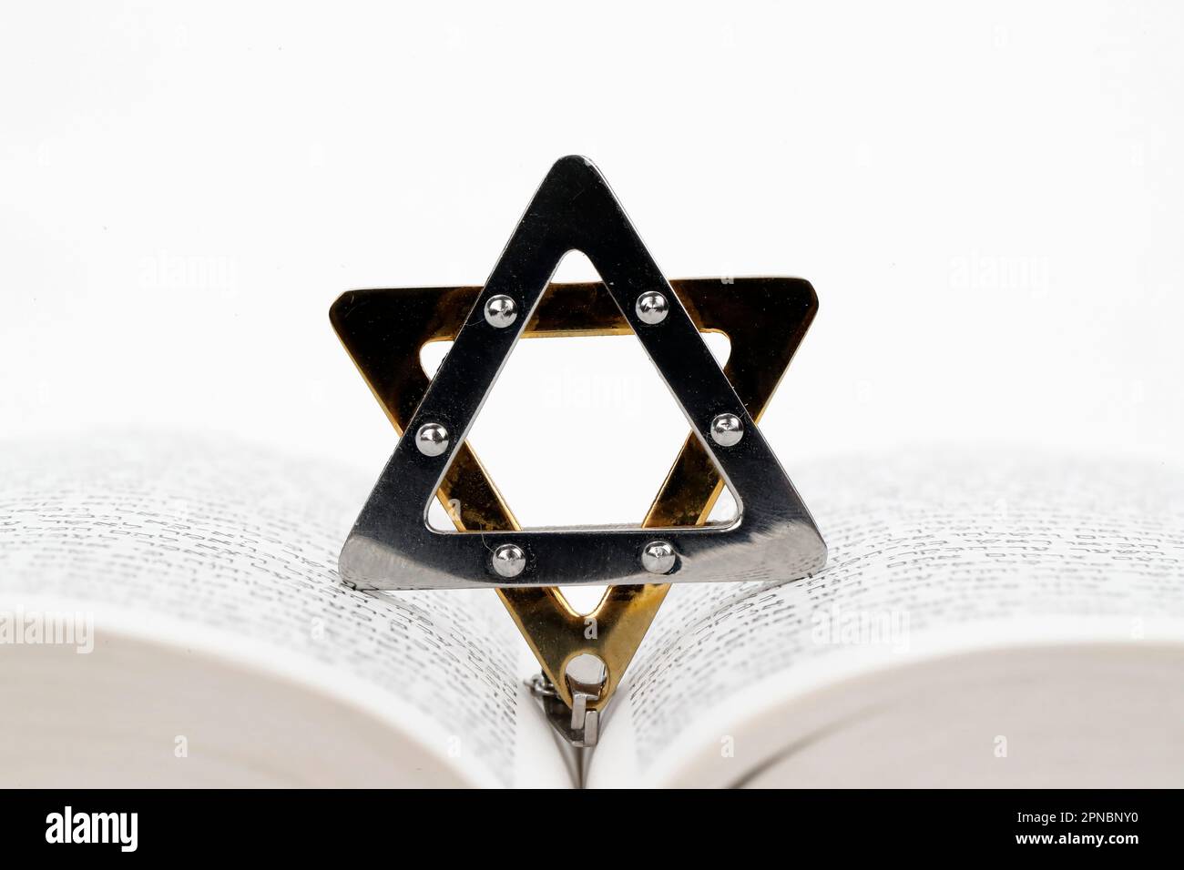 Close-up detail of a Torah in hebrew and a star of David. Jewish ...