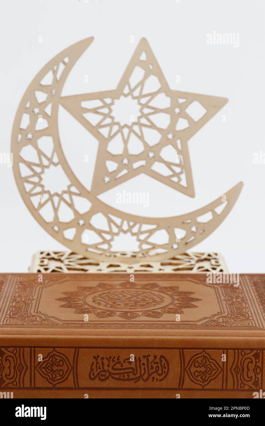 Holy Quran ( Kuran ) and Crescent and Star, symbols of Islamic faith ...