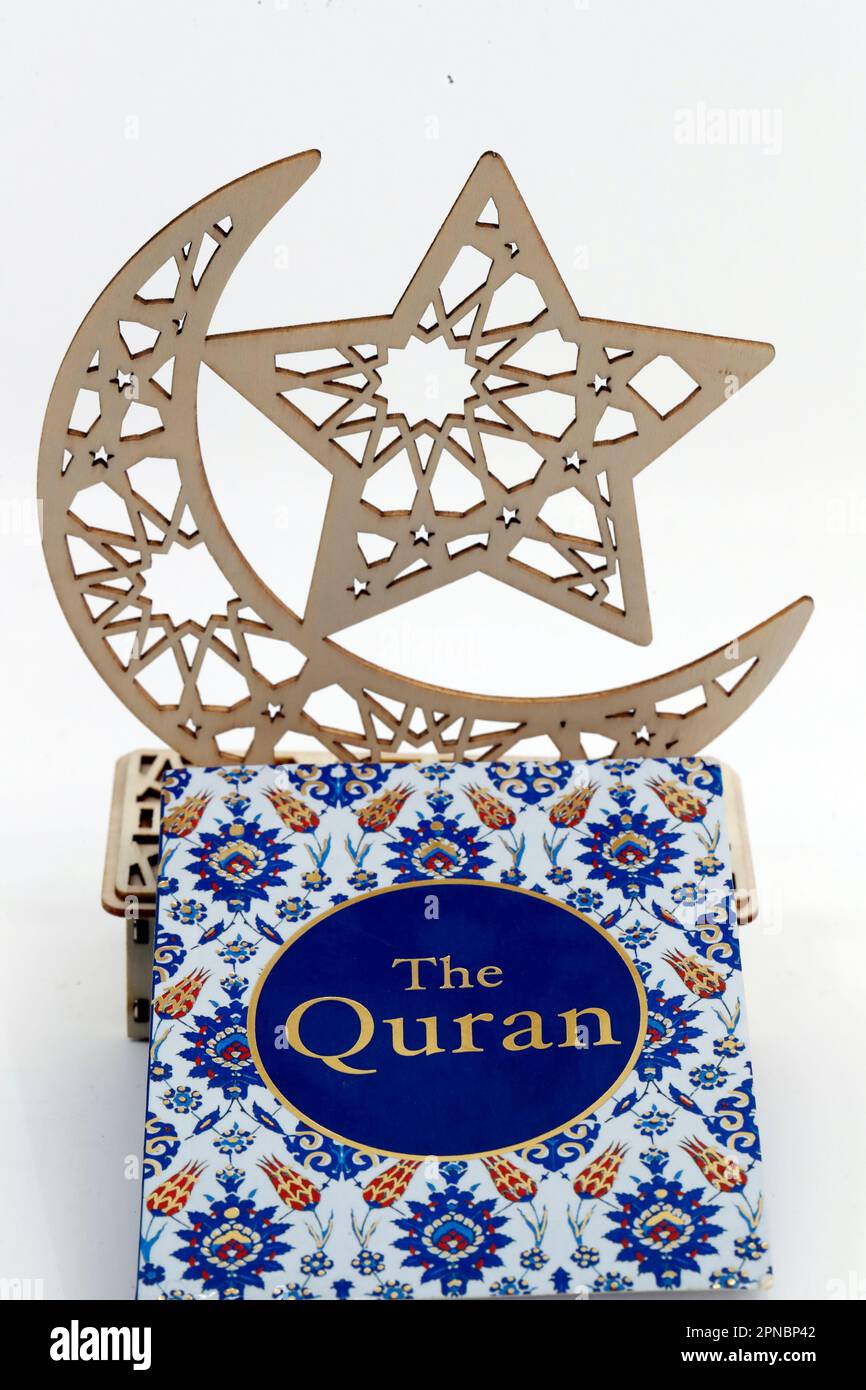 Holy Quran ( Kuran ) and Crescent and Star, symbols of Islamic faith ...