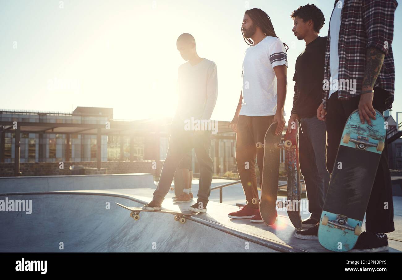 Were ready to hit the ramp. Full length shot of a group of friends ...