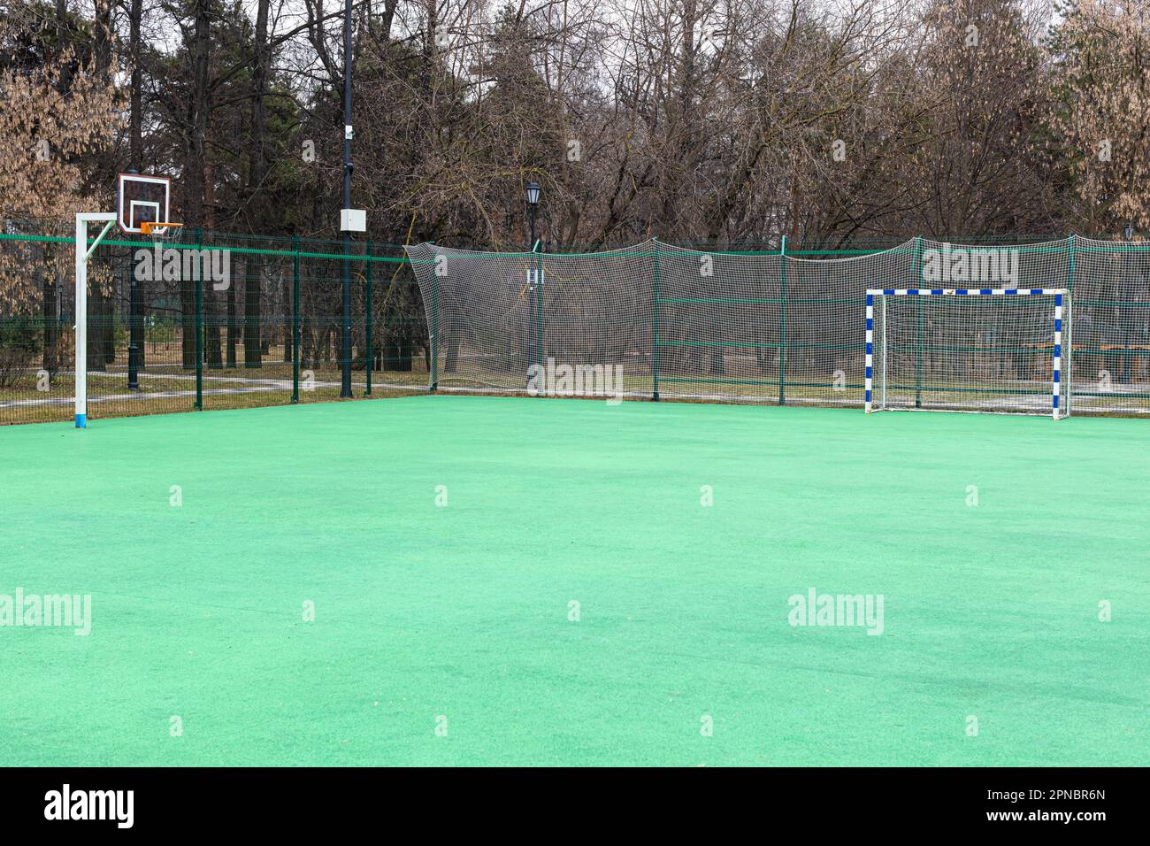 empty sports field for football and basketball. empty football field ...