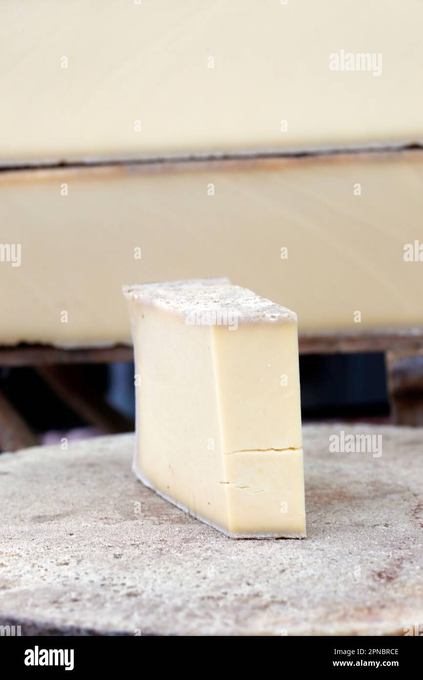 Traditional French cheese, Beaufort de Savoie. Mountain cheese for sale ...