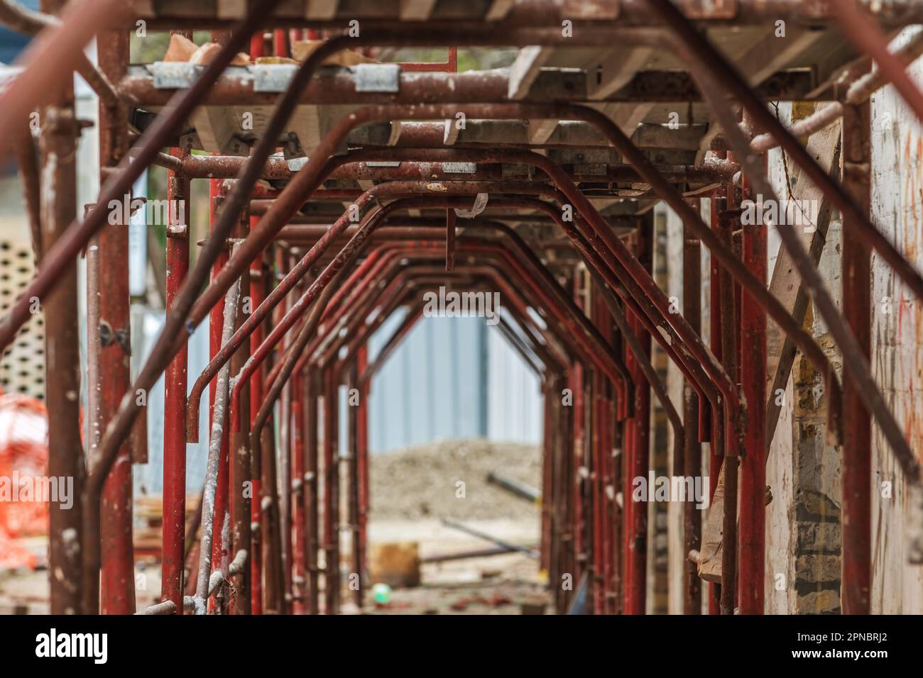 Scaffolding structure on construction site, renovation of an old ...