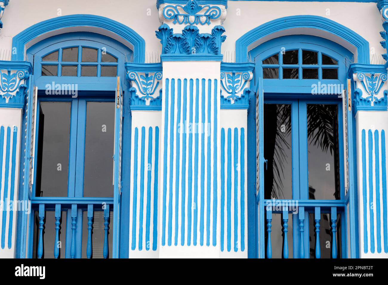 Traditional old house. Blue windows. Singapore Stock Photo - Alamy