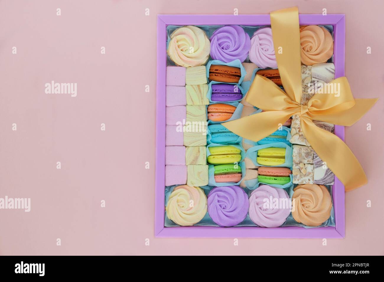 Traditional sweet desserts in box for the holiday. Macaroons ...