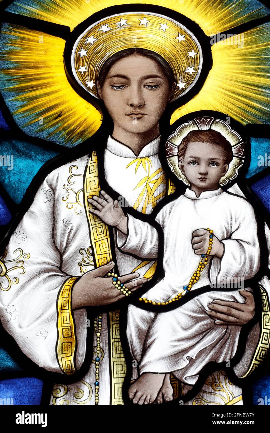 Song Vinh Church. Stained glass. Statue of Our Lady of La Vang in Ao ...