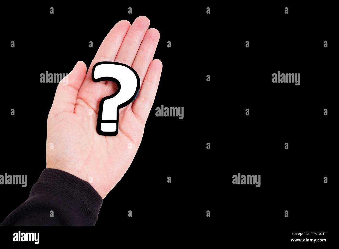 Large black and white question mark placed on a stretched palm isolated ...