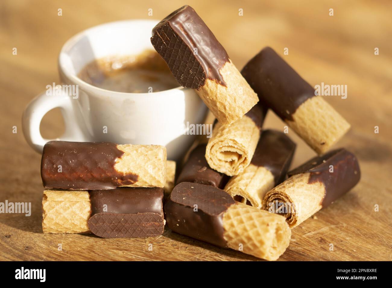 espresso coffee with round wafer cookies with chocolate Stock Photo - Alamy