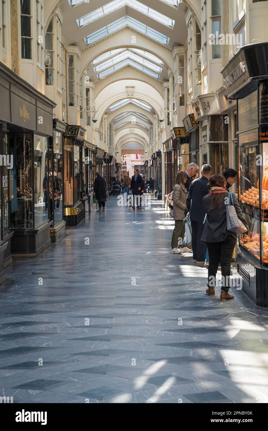 View along Burlington Arcade with people shopping. Piccadilly, London ...